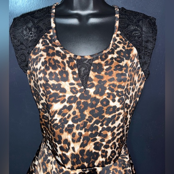 Guess | Tops | Guess Leopard And Lace Peplum Top Size Medium | Poshmark
